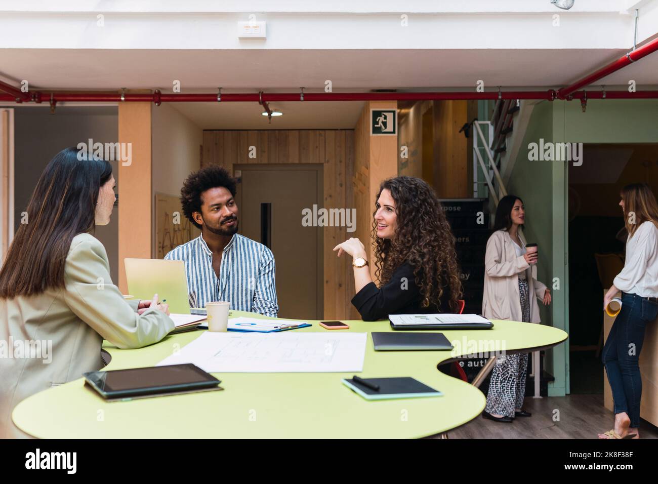 Business team having a meeting in office Stock Photo - Alamy