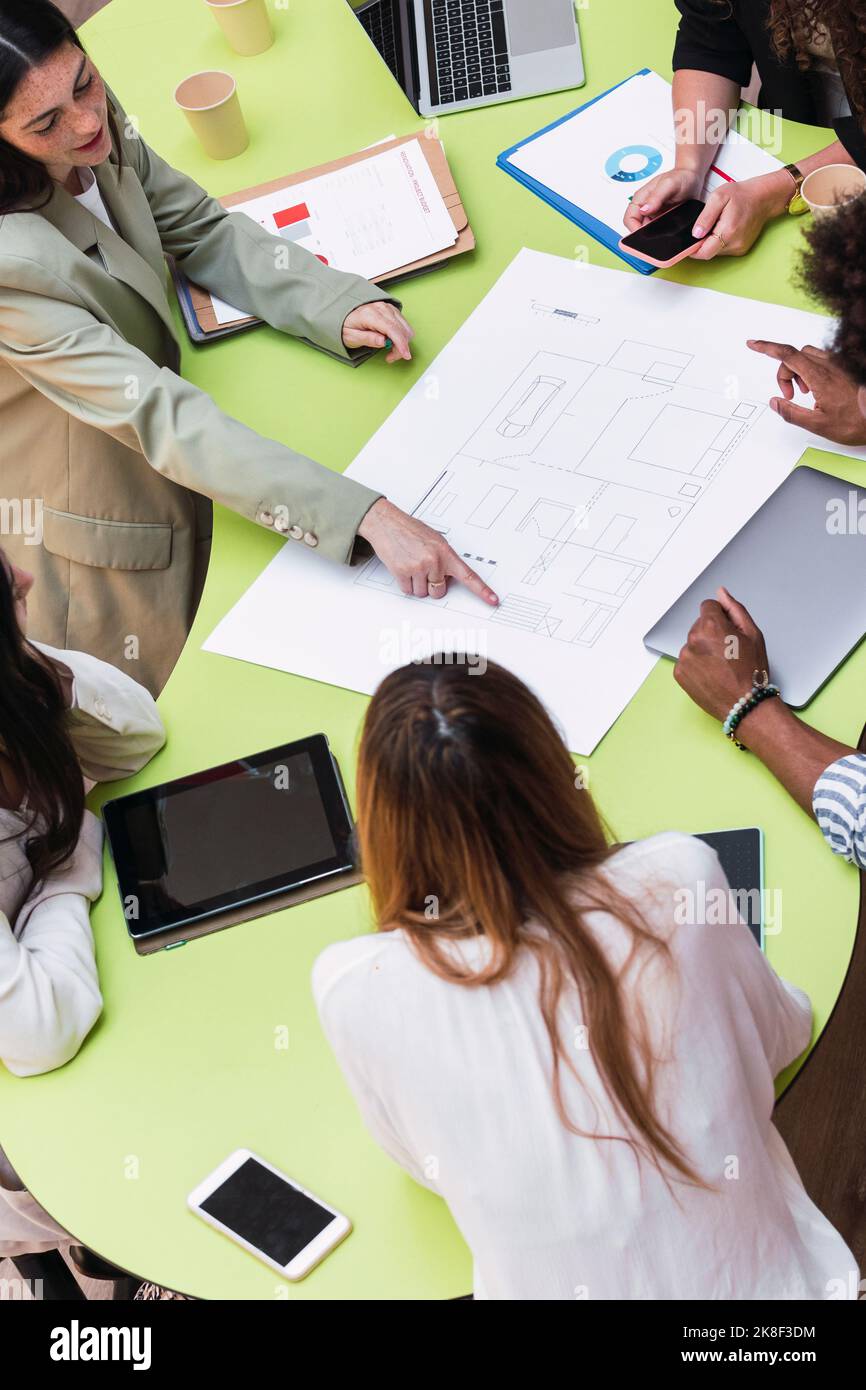 Business team having a meeting at table in conference room discussing ...