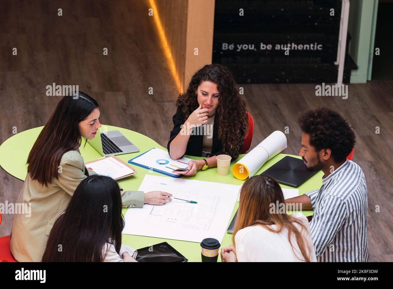 Business team having a meeting at table in conference room Stock Photo ...