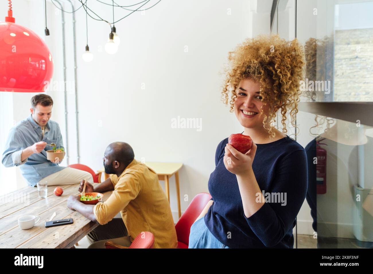 African american man eating apple hi-res stock photography and images ...