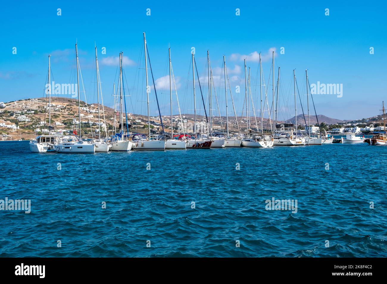 Sailboats docked in the harbor at Paros island in Greece Stock Photo ...