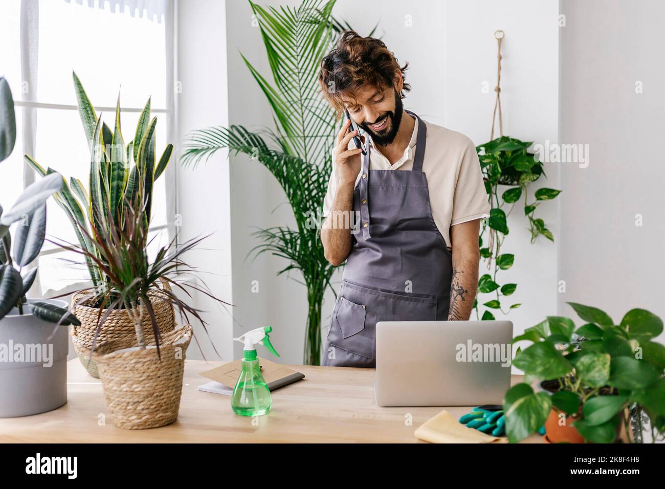 Man talking to plant hi-res stock photography and images - Alamy