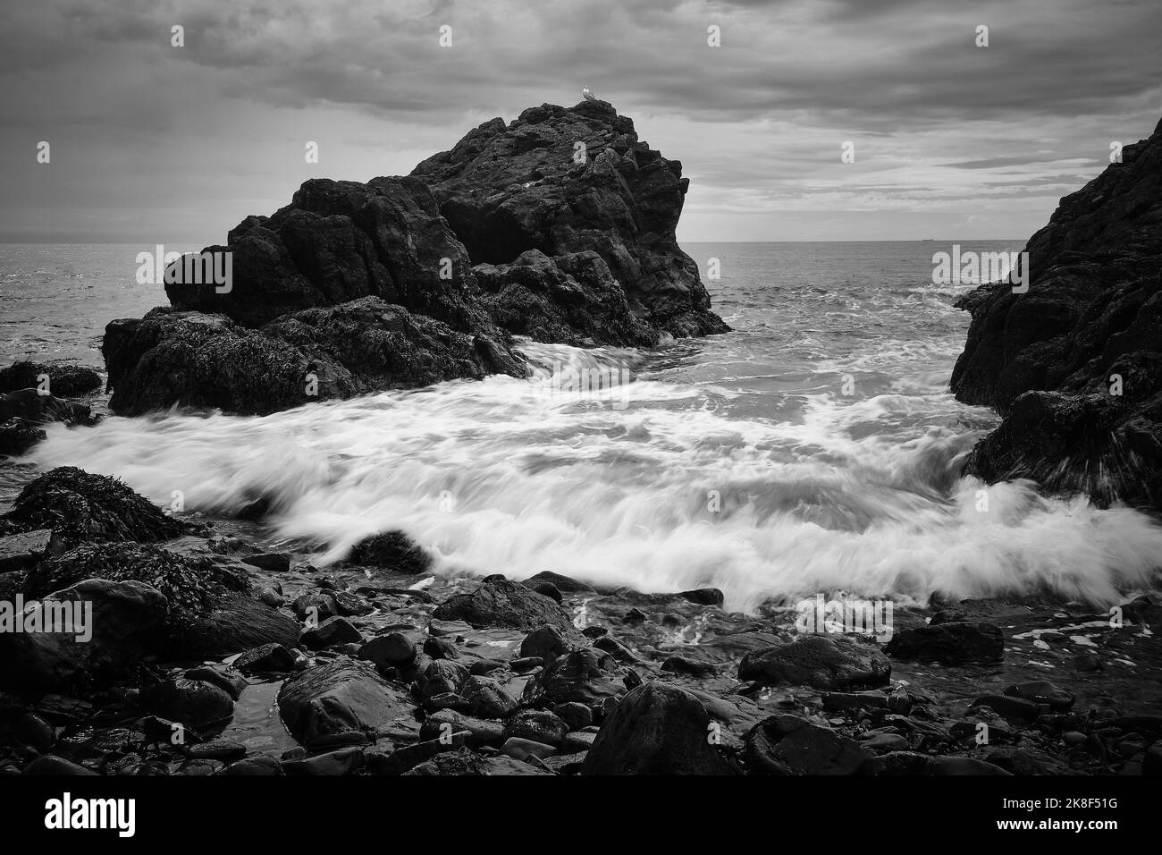 Beach with waves and rocks hi-res stock photography and images - Alamy