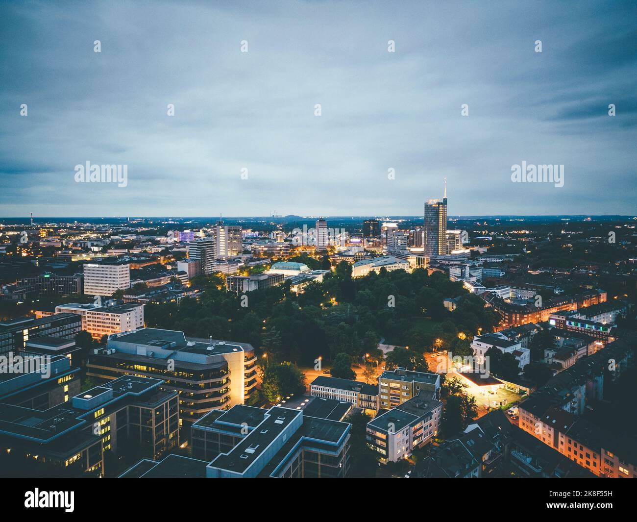 Aerial view of city buildings at dusk Stock Photo - Alamy
