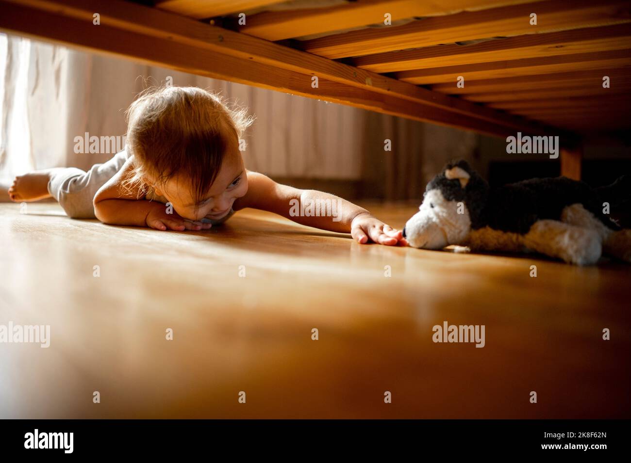 Children searching under bed hi-res stock photography and images - Alamy