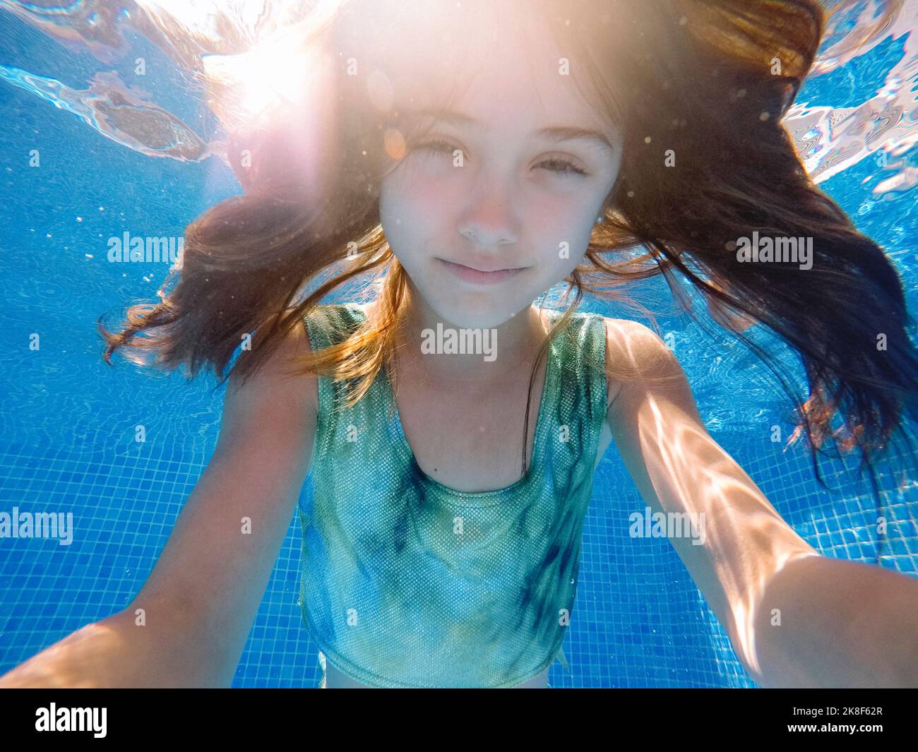 Person underwater swimming pool hi-res stock photography and images - Alamy