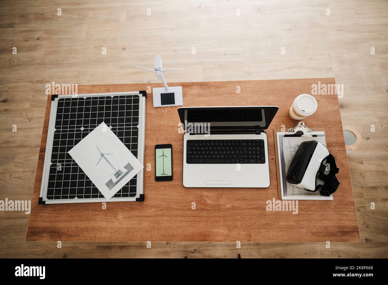 Portable solar panel and windturbine model on engineer's desk Stock ...