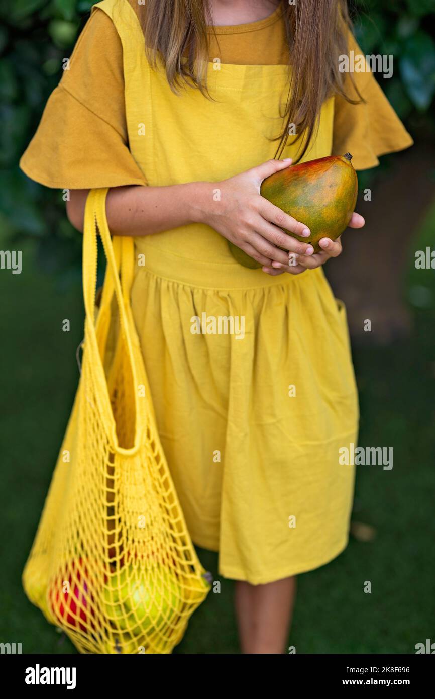 Mango girl hi-res stock photography and images - Alamy
