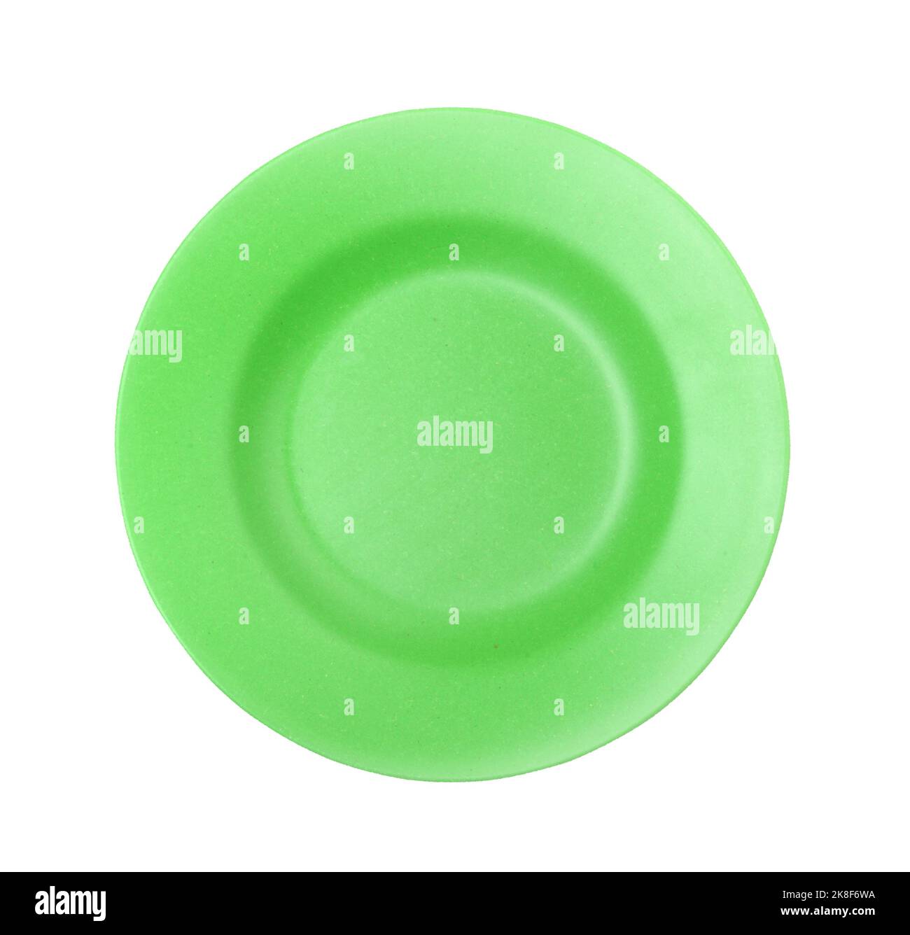 Green food plate isolated on white. Top view Stock Photo - Alamy