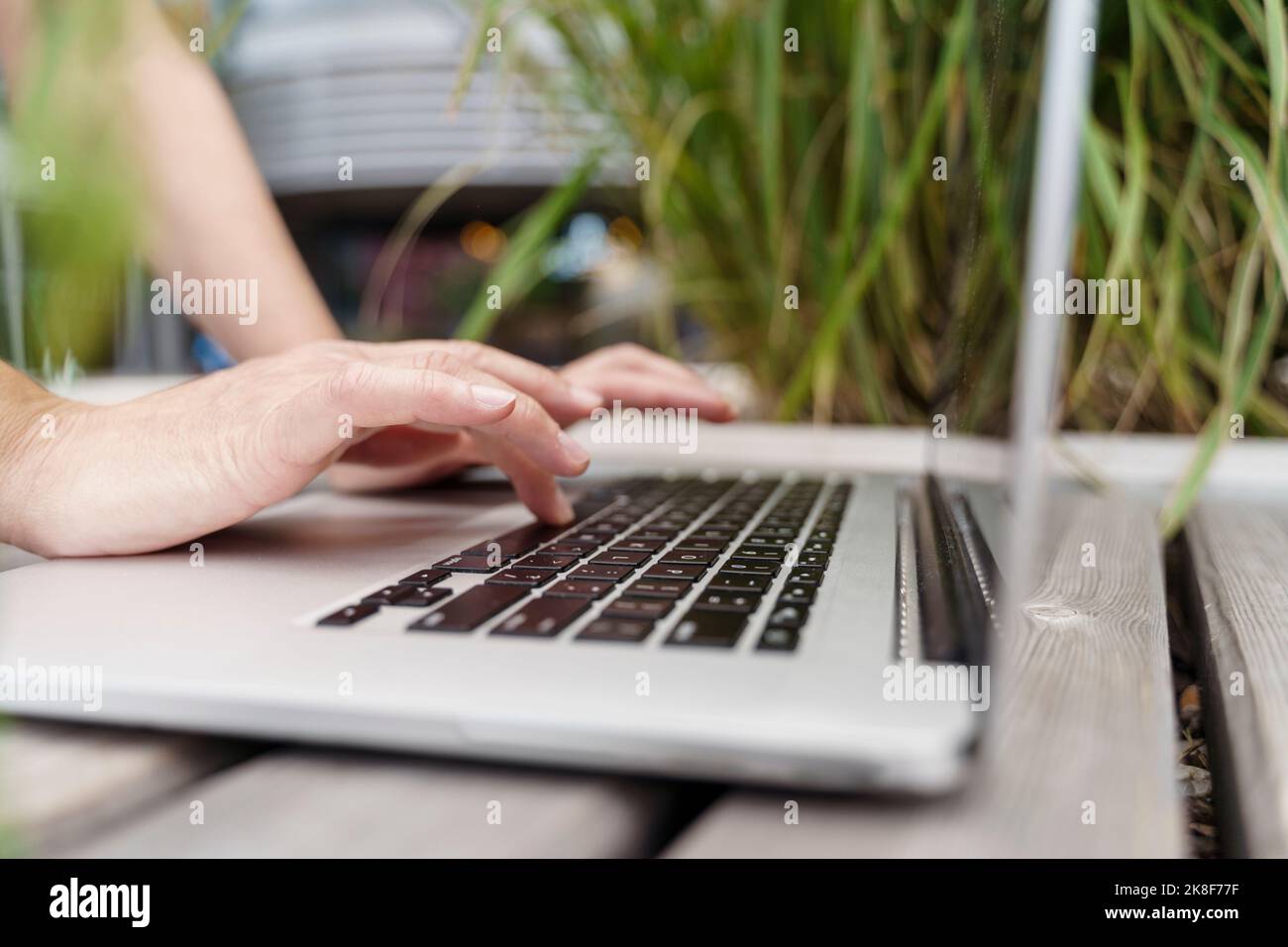 Woman hand using laptop hi-res stock photography and images - Alamy