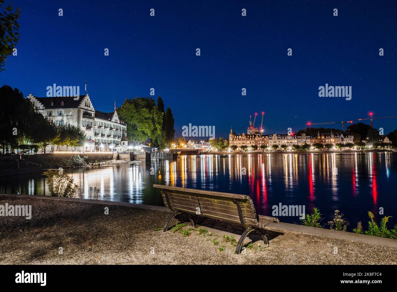Germany, Baden-Wurttemberg, Konstanz, Shore of Lake Constance at night with city lights in ...