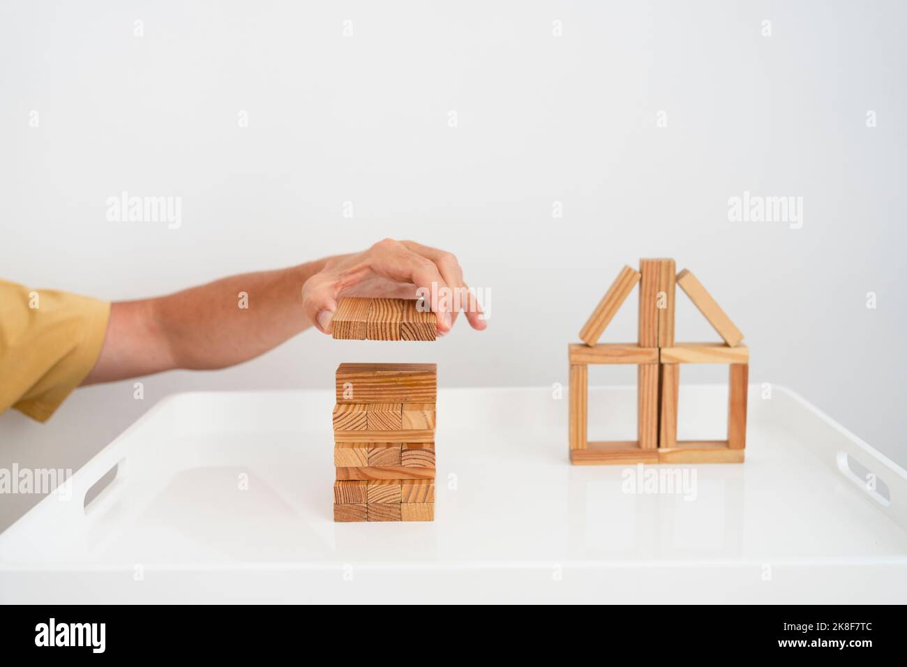 Hand building blocks hi-res stock photography and images - Alamy