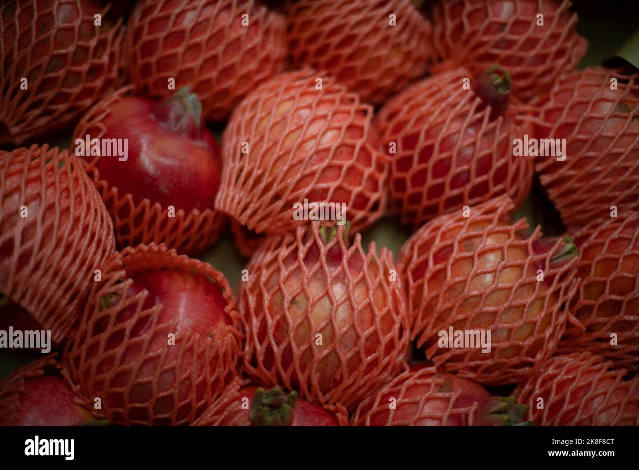 Pomegranate on market. Fruit in box. Fruits in net. Market Details ...