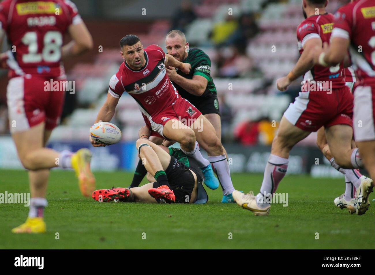 Leigh, UK. 23rd Oct, 2022. *** Josh Mansour of Lebanon offloads during ...