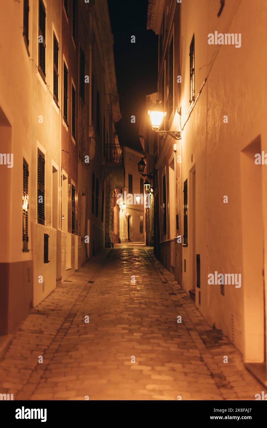 Empty illuminated alley night hi-res stock photography and images - Alamy