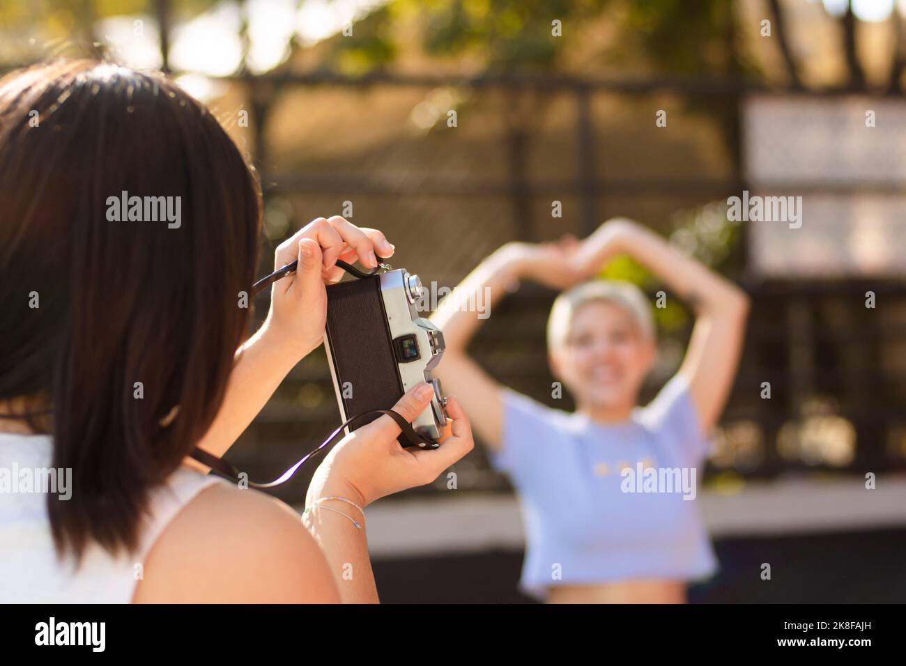 Two male friends photographing hi-res stock photography and images - Alamy