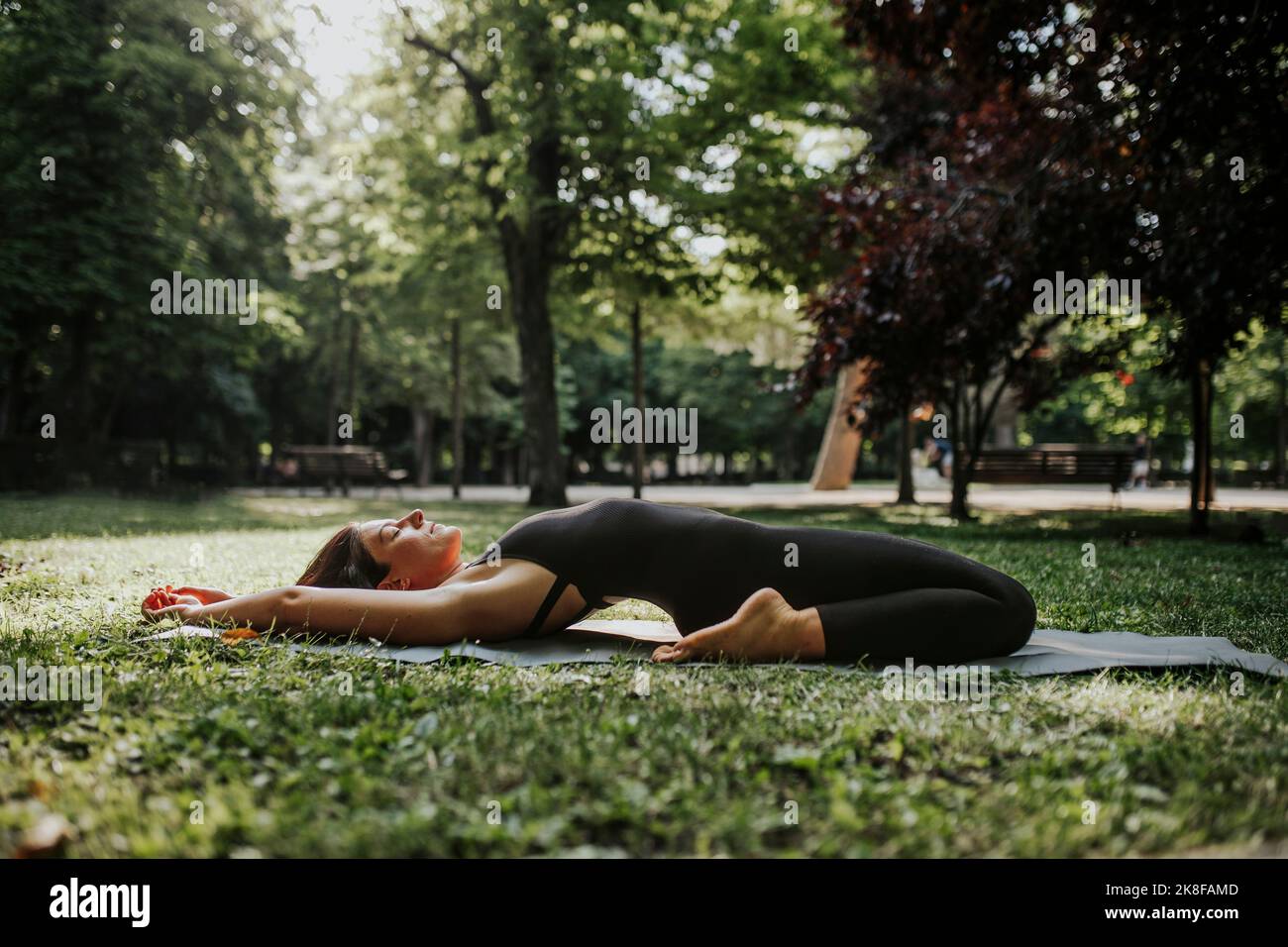 Back view of women doing yoga hi-res stock photography and images - Alamy