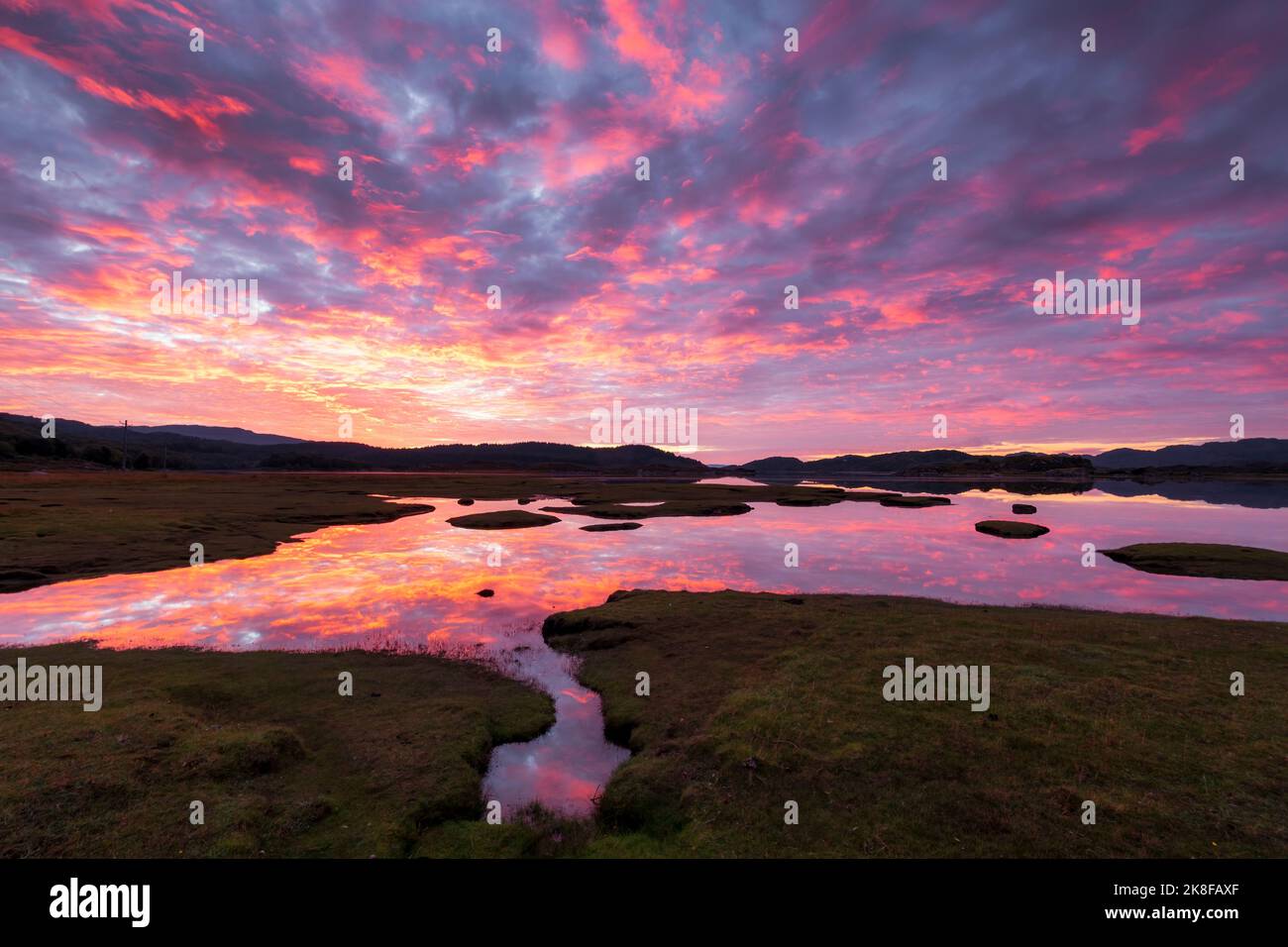 Beautiful view kentra bay under cloudy sky sunset hi-res stock ...