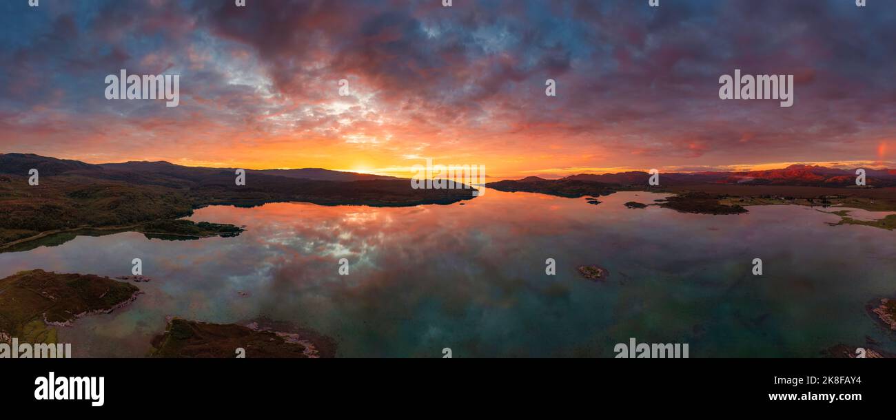 Aerial view of Kentra Bay with Cullin mountain range at sunset ...