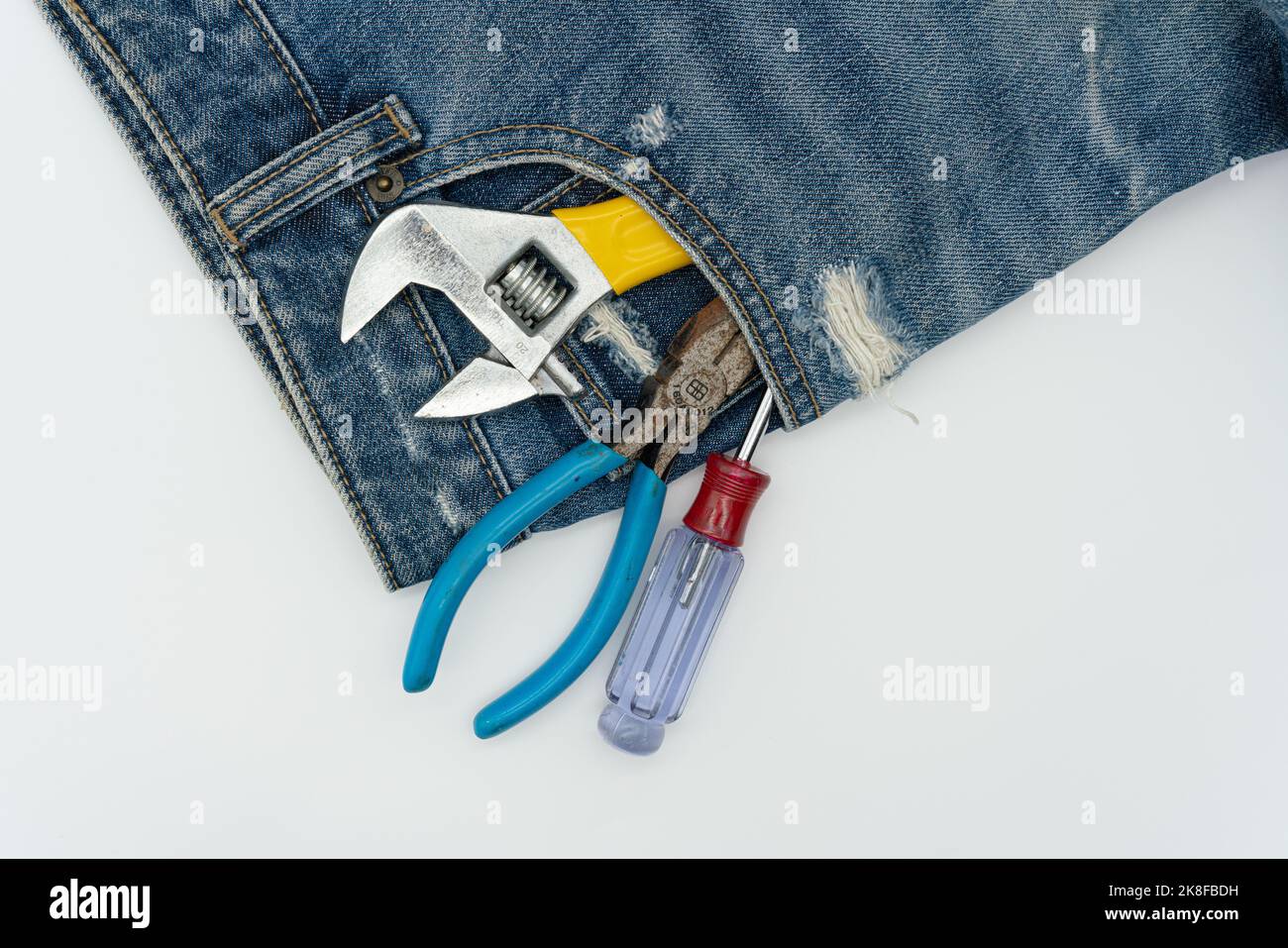 Various work tools and work clothes concept Stock Photo - Alamy