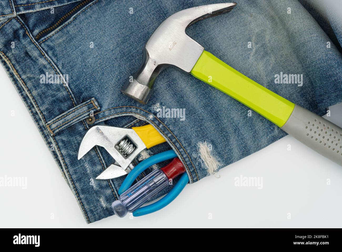 Various work tools and work clothes concept Stock Photo - Alamy