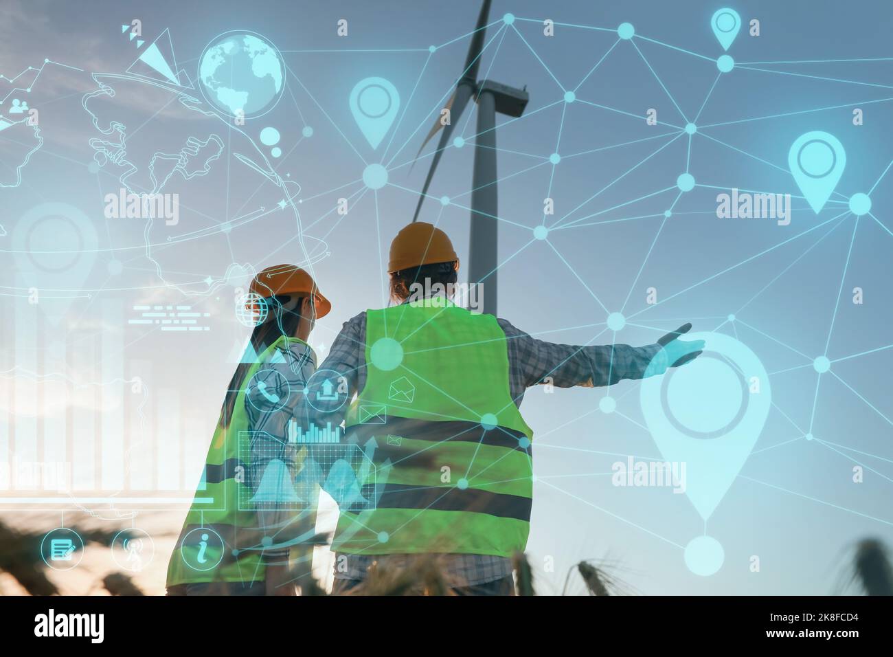 Engineers on windmill farm for electric power generation Stock Photo ...