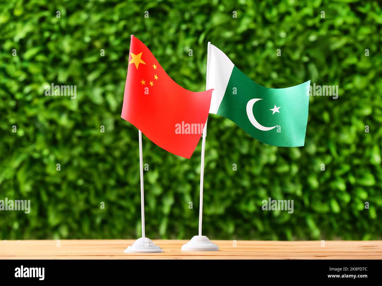 National flags of China and Pakistan on table outdoors Stock Photo - Alamy