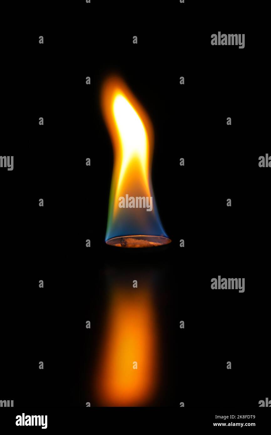 Yellow fire flame on black background Stock Photo - Alamy
