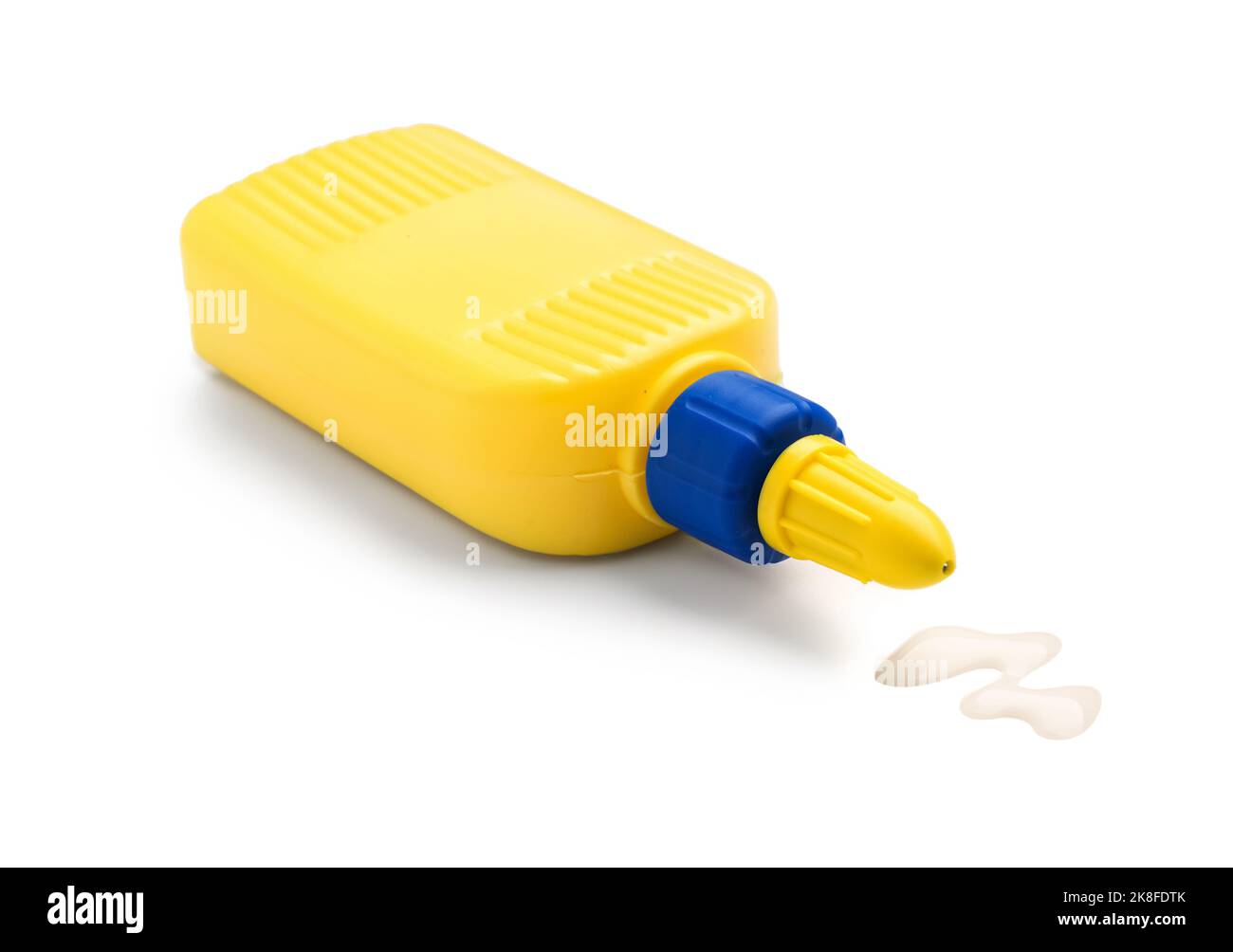 Yellow bottle of glue isolated on white background Stock Photo - Alamy
