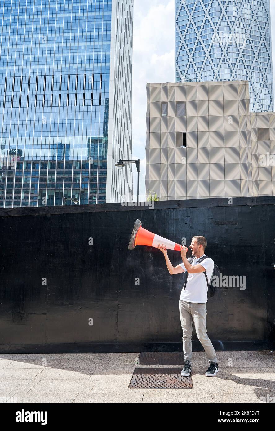Man shouting traffic cone hi-res stock photography and images - Alamy