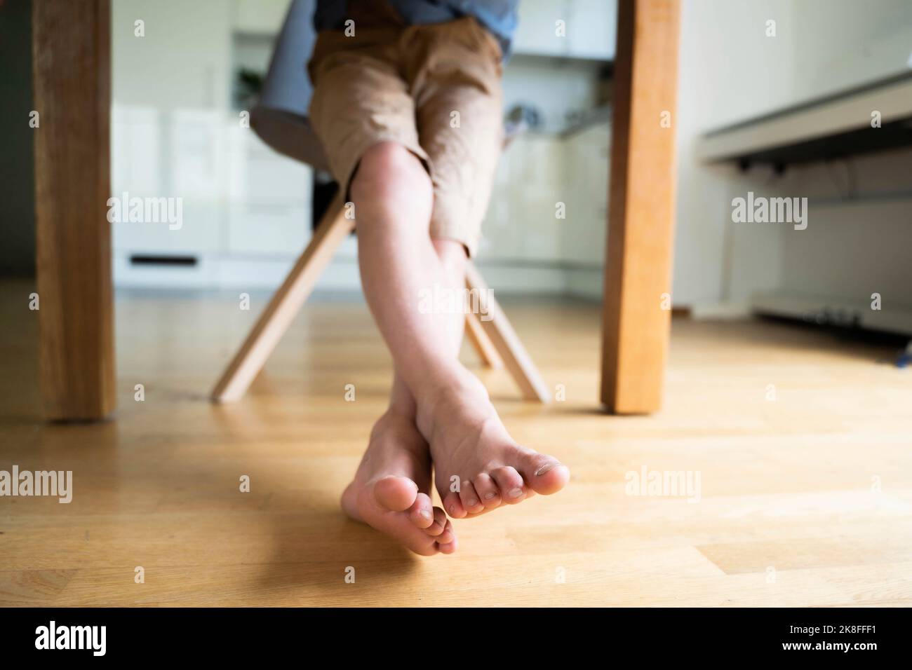 Crossed legs on chair hi-res stock photography and images - Alamy