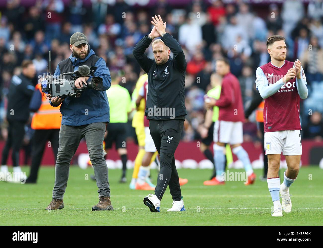 Aston Villa caretaker manager Aaron Danks applauds the fans following ...