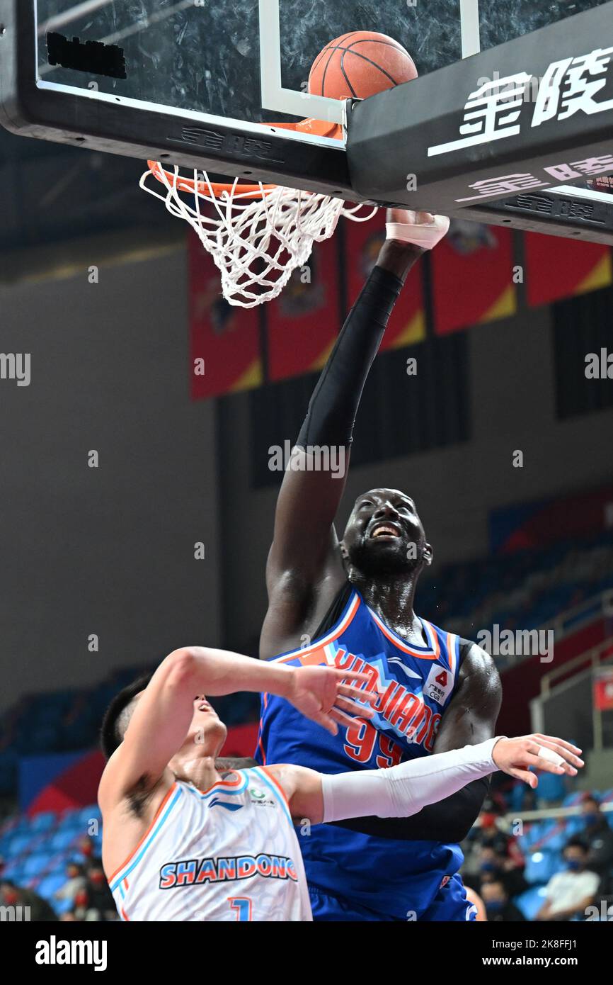 Hangzhou, China's Zhejiang Province. 23rd Oct, 2022. Tacko Fall (R) of ...