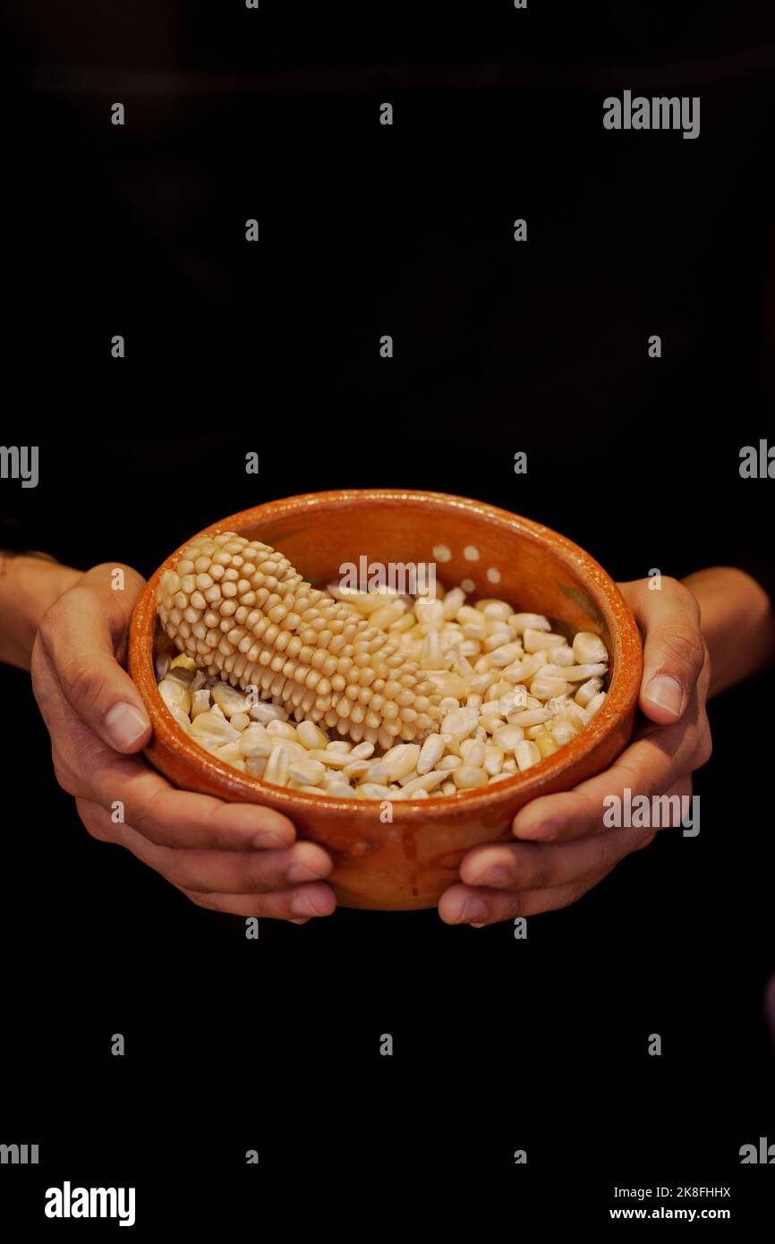 Man holding bowl corn hi-res stock photography and images - Alamy