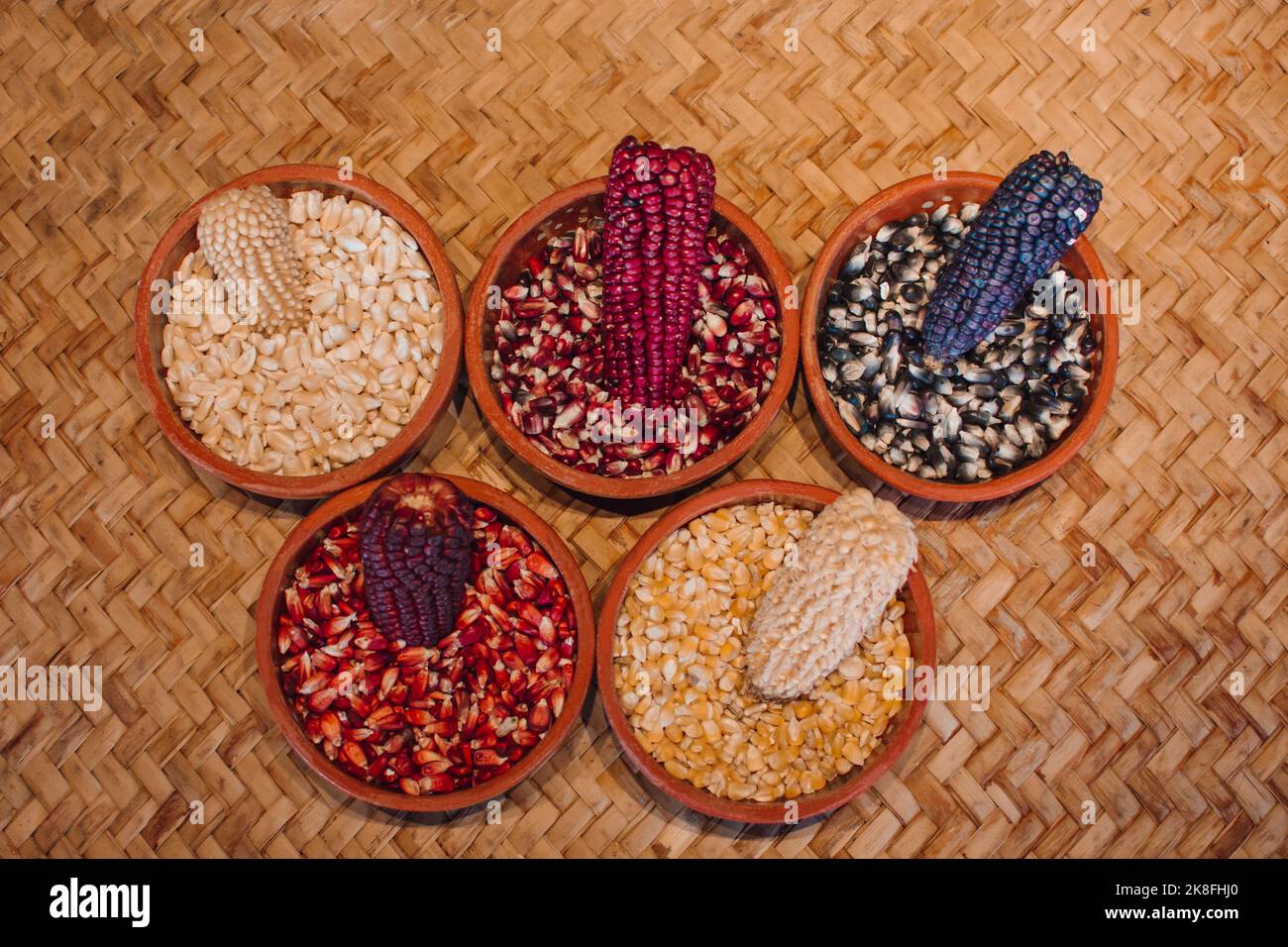 Bowls with different varieties of corn grains Stock Photo - Alamy