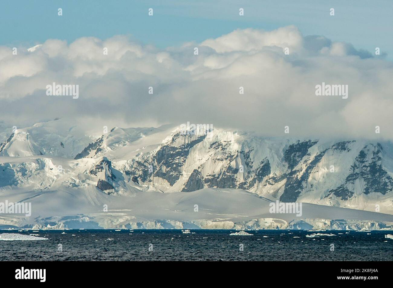 Snow and ice covered mountain at Georges point, antarctic peninsula ...