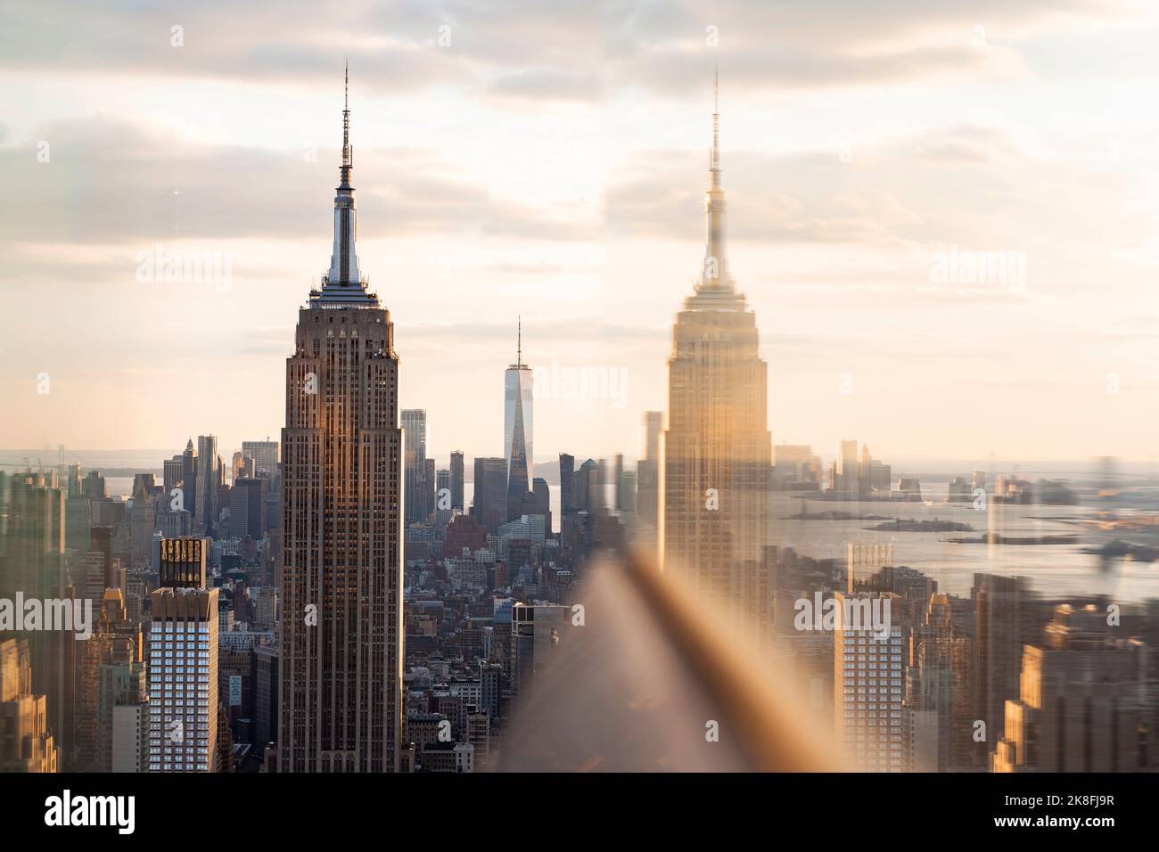 USA, New York, New York City, Midtown Manhattan at sunset seen through ...