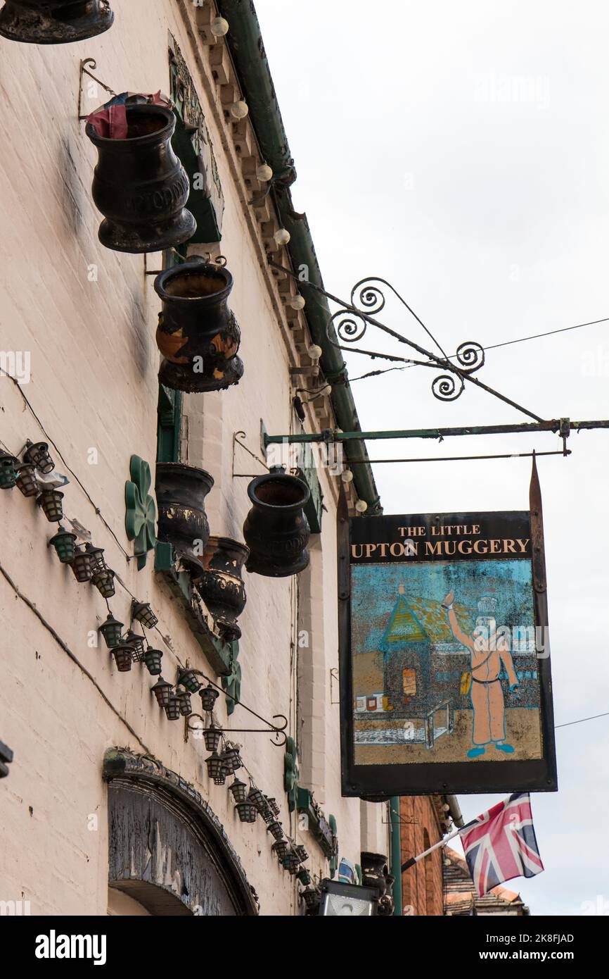 The little Upton Muggery pub sign Stock Photo - Alamy