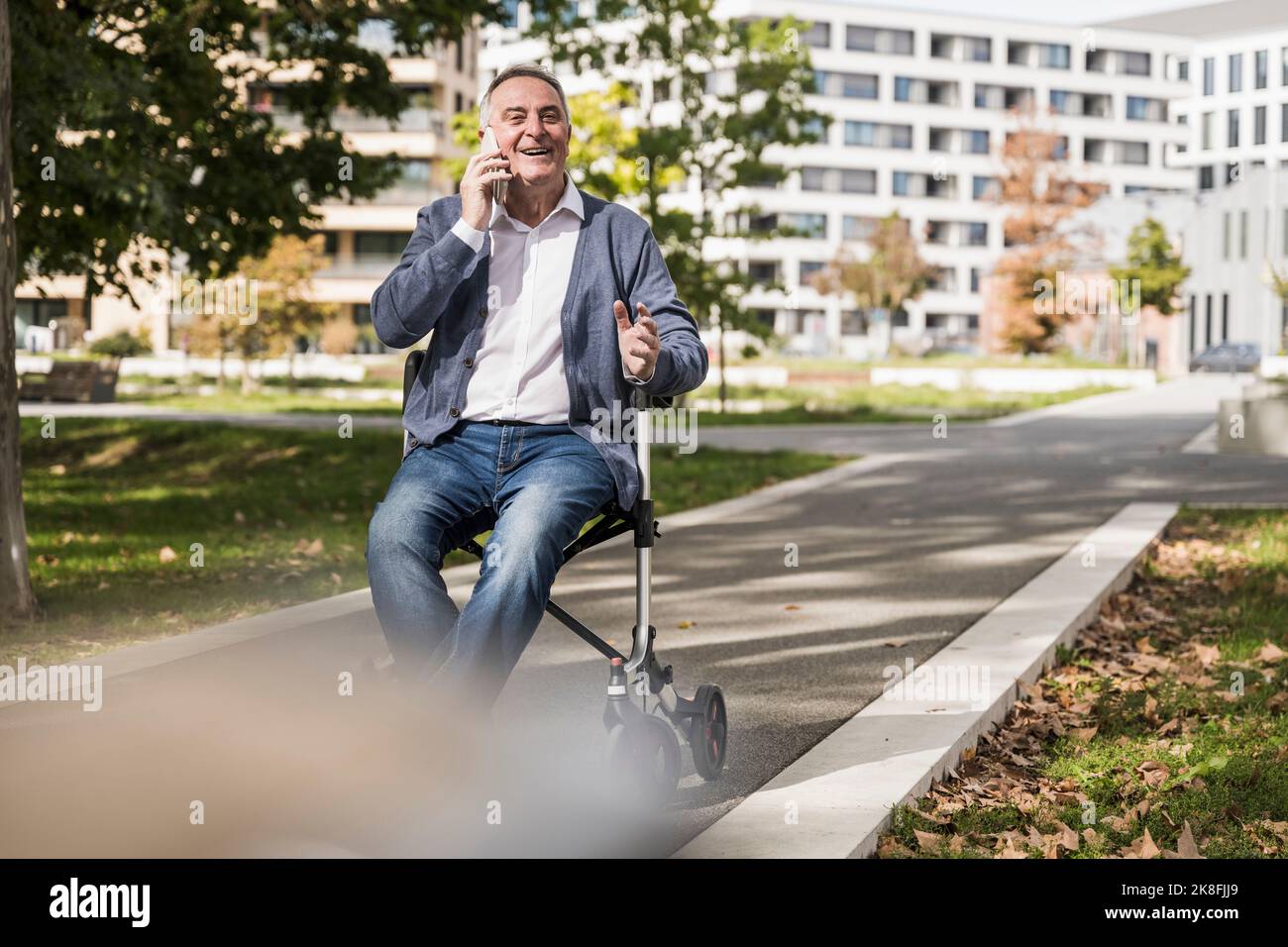 Man sitting walker smiling hi-res stock photography and images - Alamy