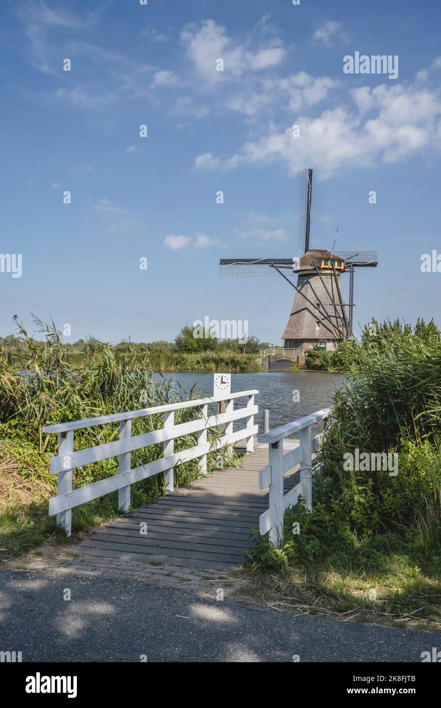Riverside boardwalk historic windmill background hi-res stock ...