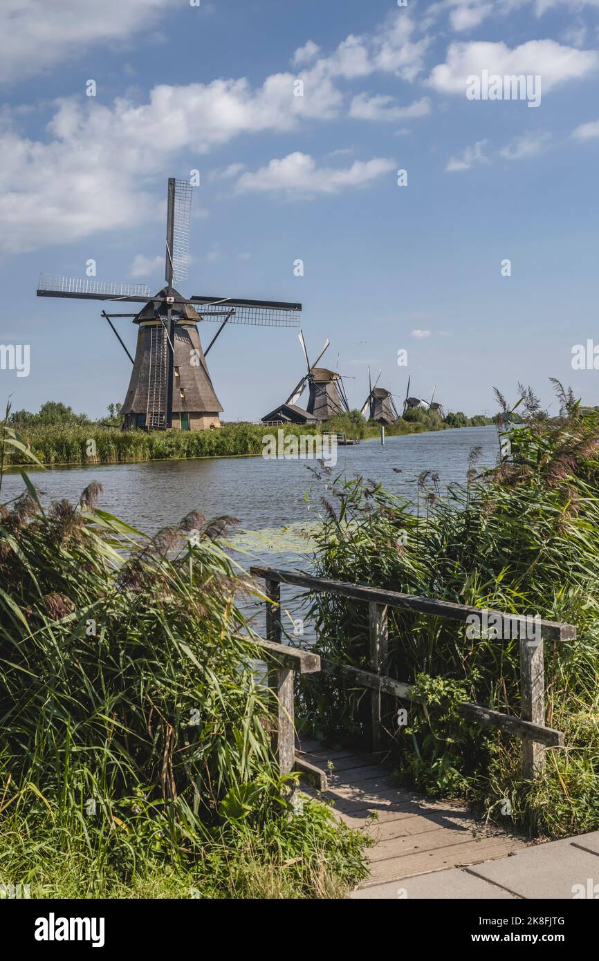 Riverside boardwalk historic windmill background hi-res stock ...