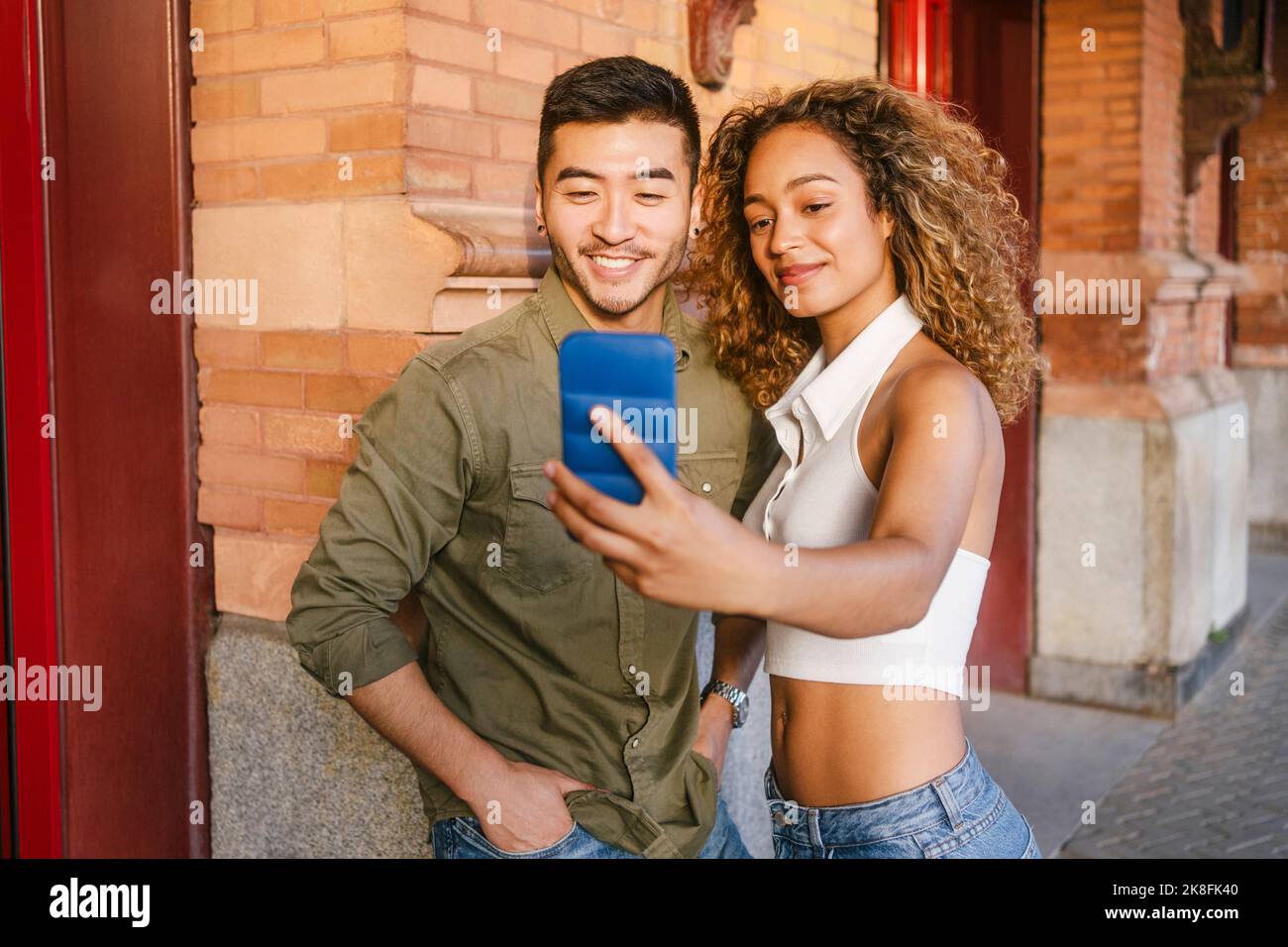 Mobile multiracial hi-res stock photography and images - Alamy