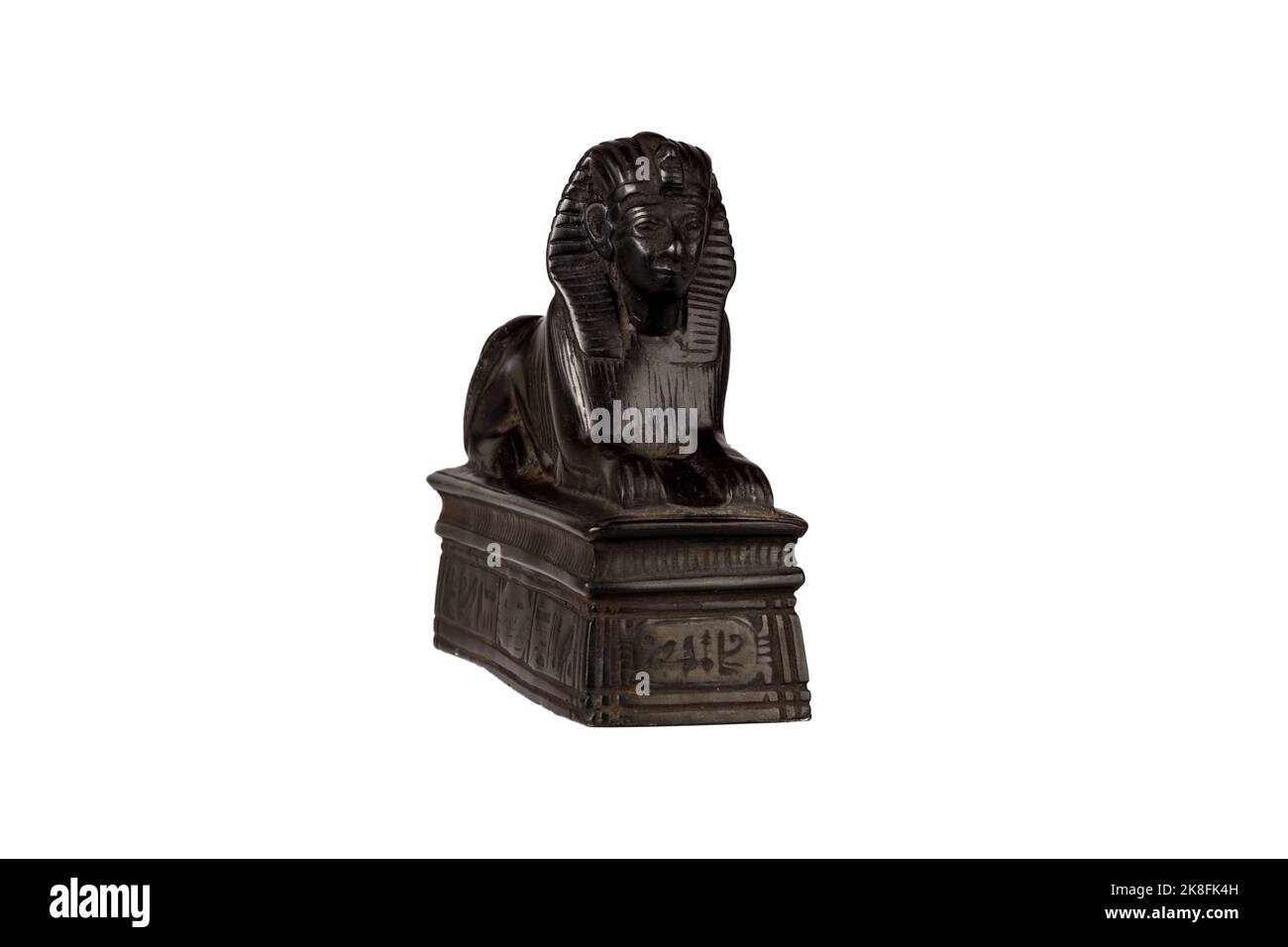 egyptian sphinx statue from black stone isolated on white background ...