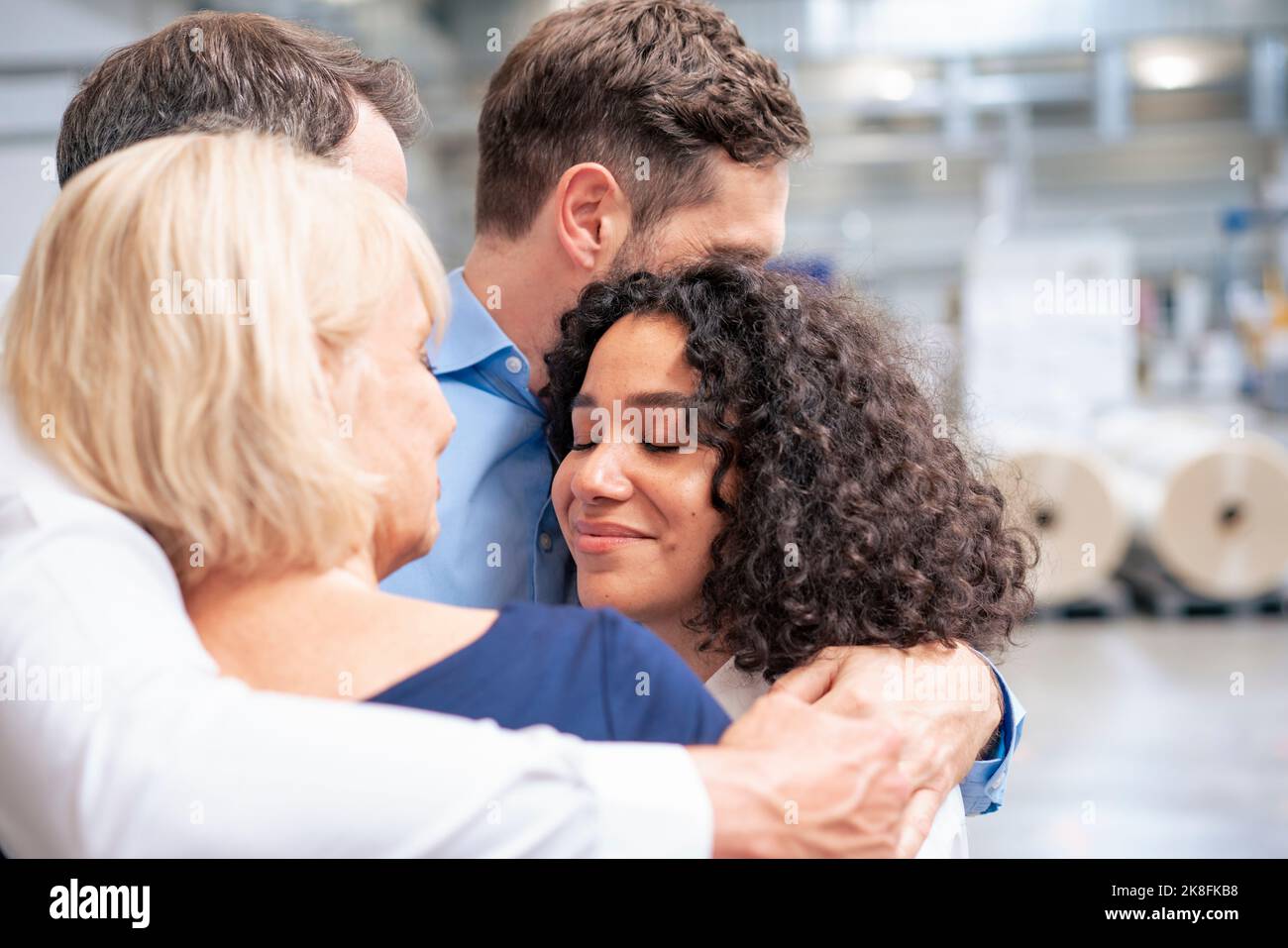 Businessman eyes closed embracing hi-res stock photography and images ...