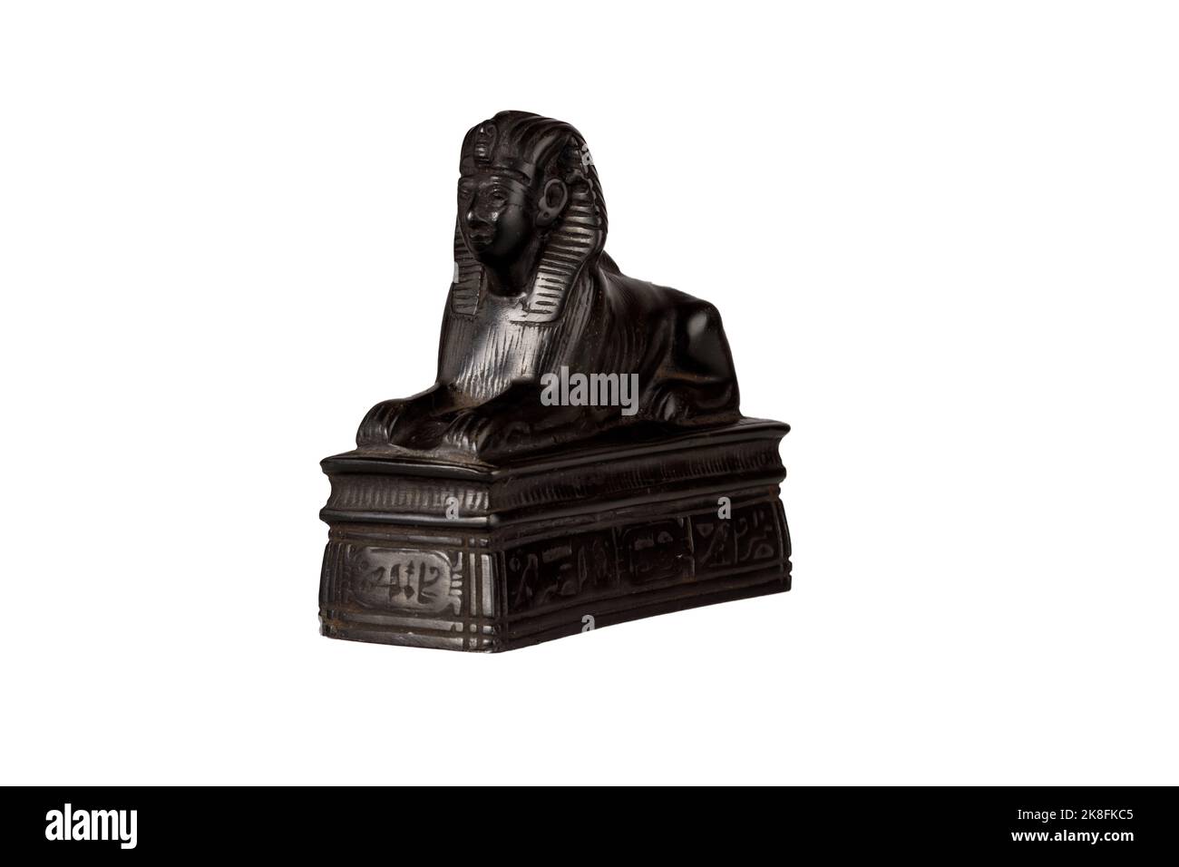egyptian sphinx statue from black stone isolated on white background ...