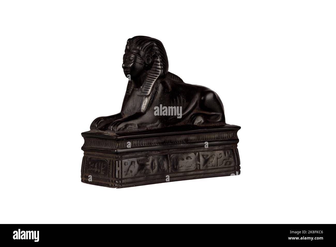 egyptian sphinx statue from black stone isolated on white background ...