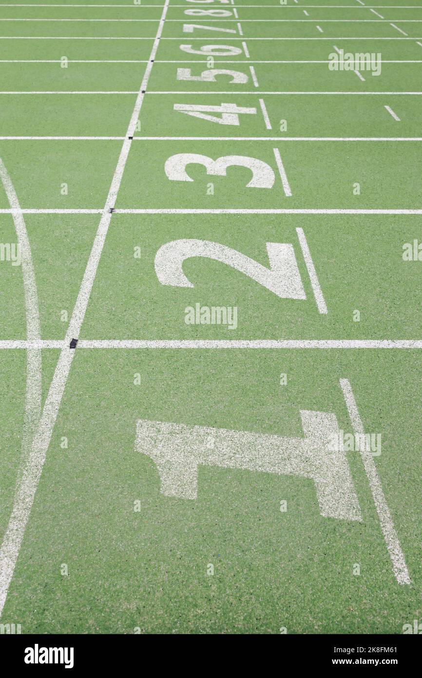 Running track with numbers Stock Photo - Alamy
