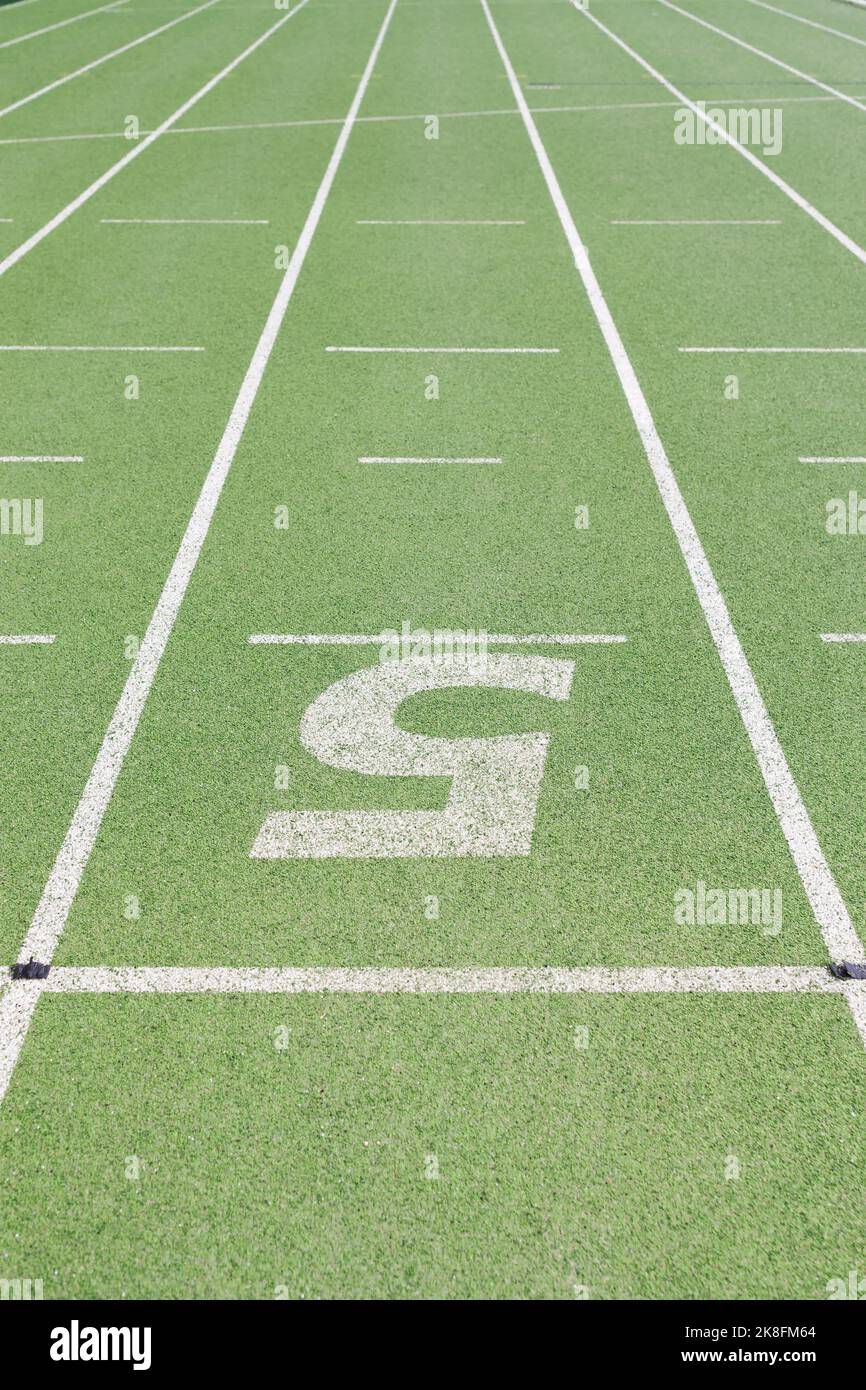 Number on empty running track Stock Photo - Alamy