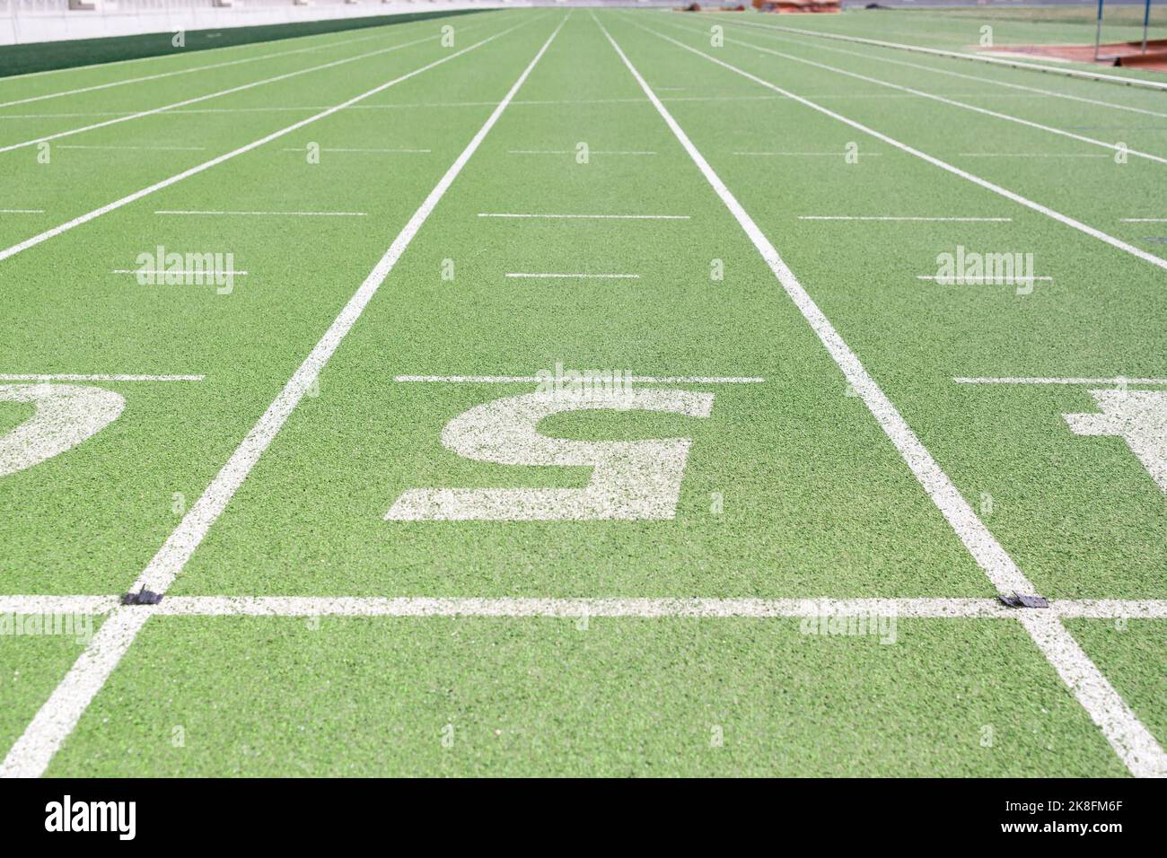 Running track field numbers hi-res stock photography and images - Alamy