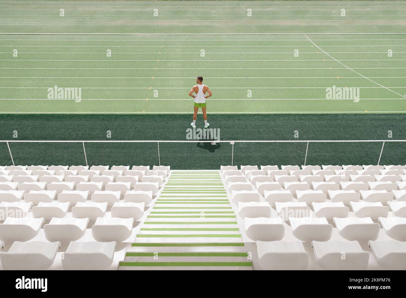 Sportsman standing on running track Stock Photo - Alamy